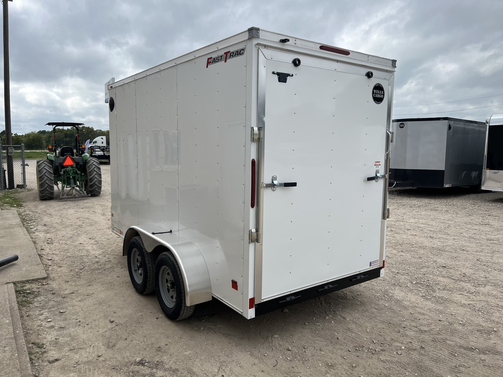 2024 Wells Cargo 6X12 Extra Height Tandem Axle Enclosed Trailer